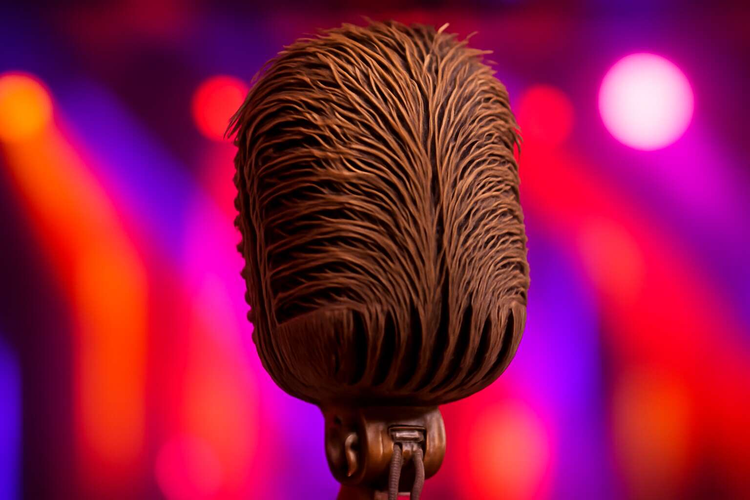 Say Goodbye to Microphone Hair: Top Tips to Keep Your Look Picture ...